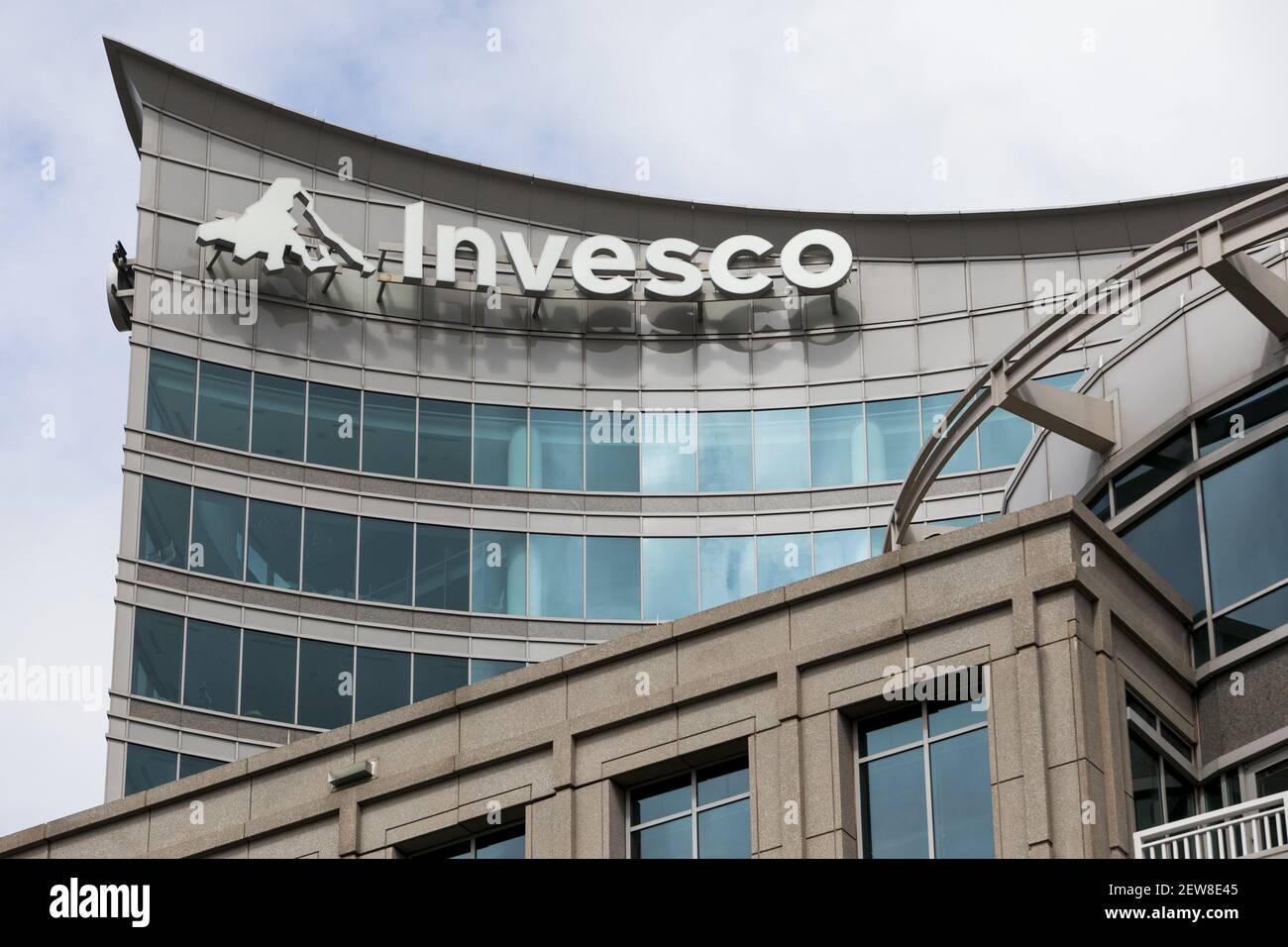 A logo sign outside of the headquarters of Invesco Ltd., in Atlanta ...
