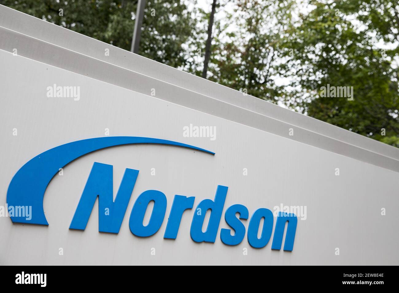 A logo sign outside a facility occupied by the Nordson Corporation in ...