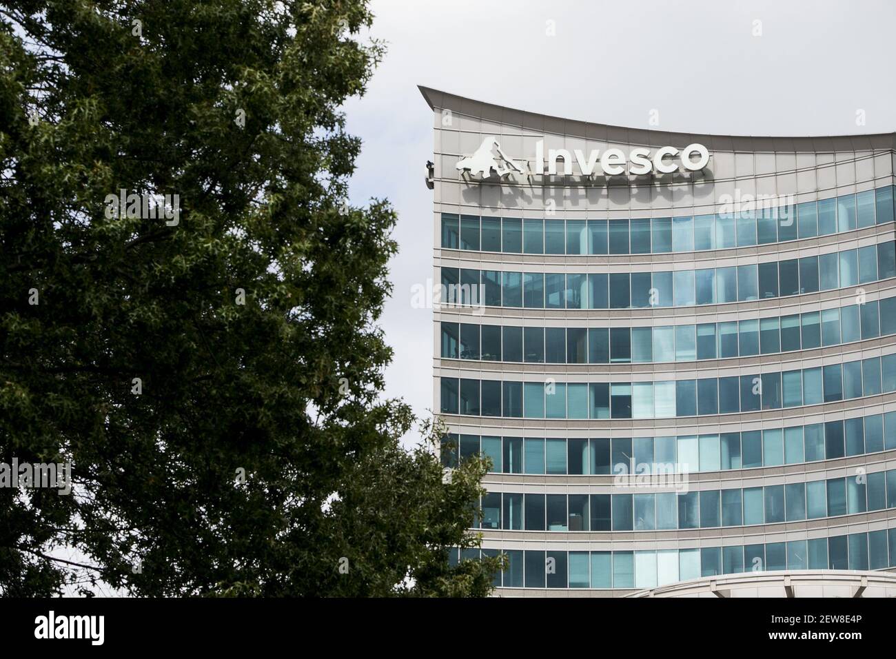 A logo sign outside of the headquarters of Invesco Ltd., in Atlanta ...