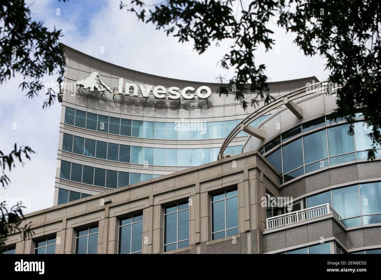 A logo sign outside of the headquarters of Invesco Ltd., in Atlanta ...