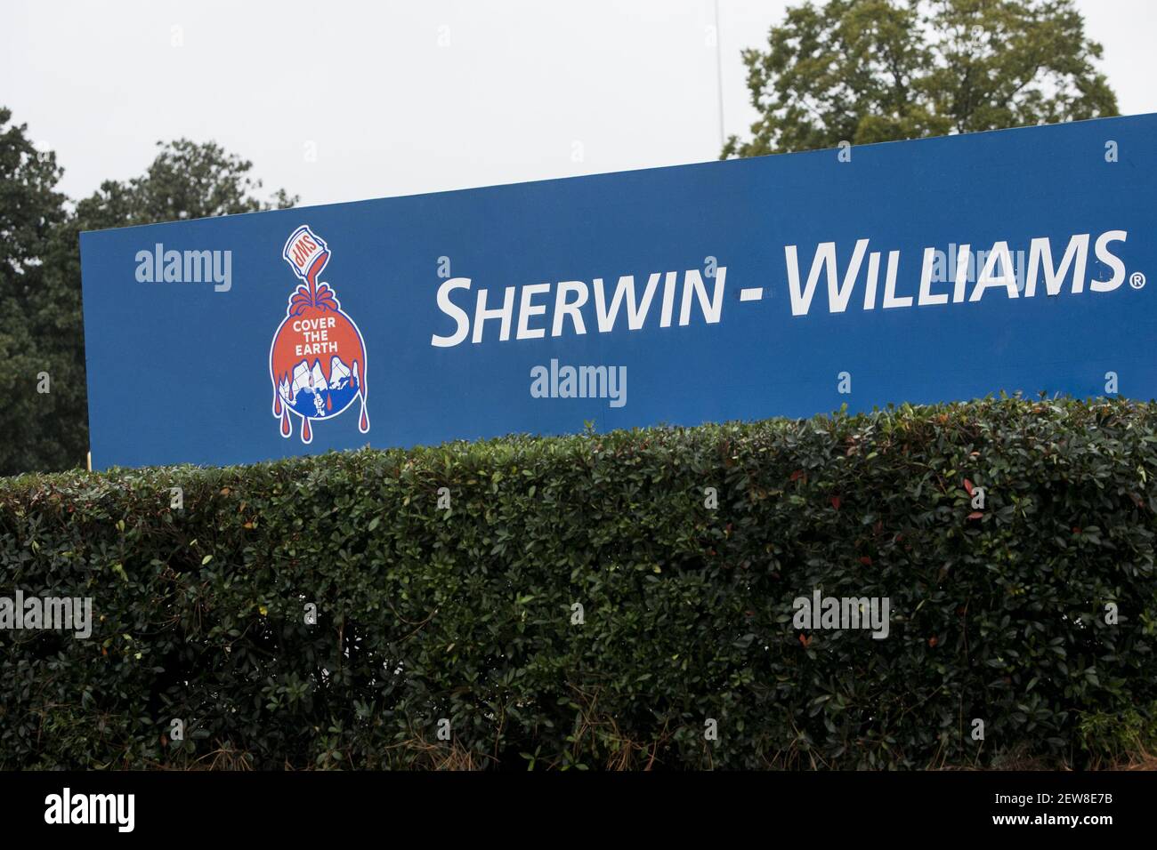 A logo sign outside of a facility occupied by The Sherwin-Williams ...