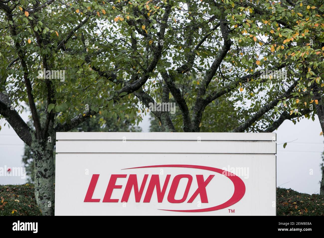A logo sign outside of a facility occupied by Lennox International Inc ...