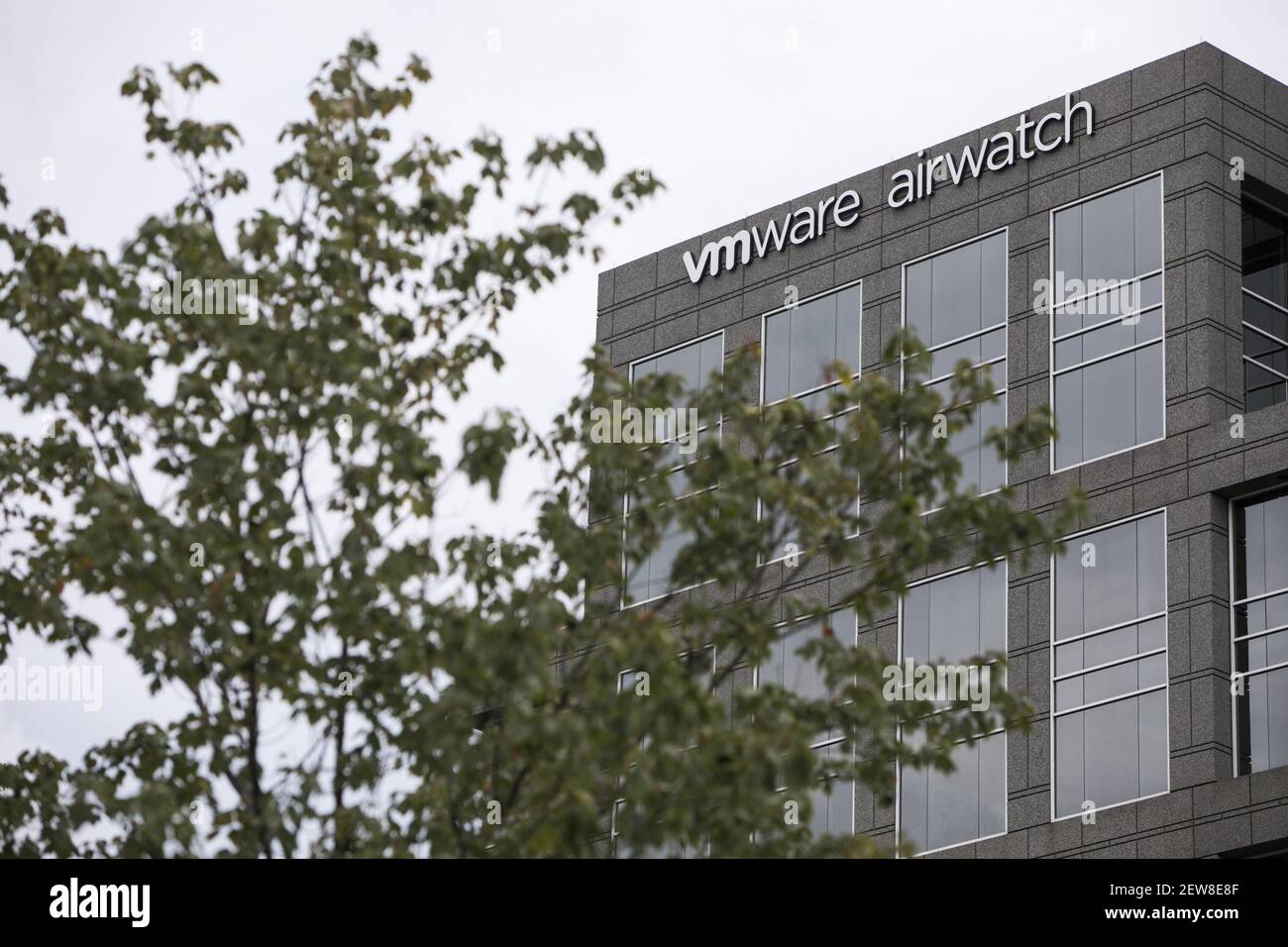 A logo sign outside of a facility occupied by VMware Airwatch in ...