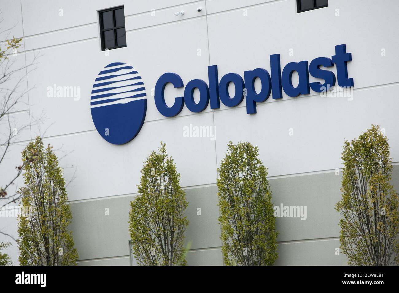A logo sign outside of a facility occupied by Coloplast in Lithia ...