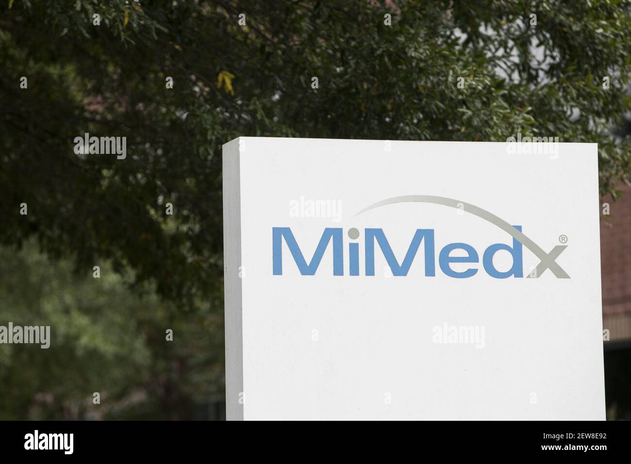 A logo sign outside of the headquarters of MiMedx in Marietta, Georgia ...