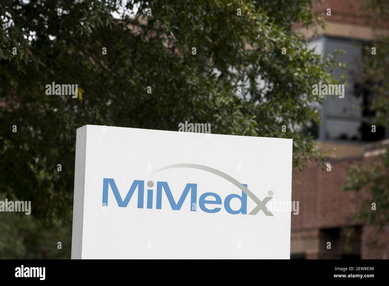 A logo sign outside of the headquarters of MiMedx in Marietta, Georgia ...