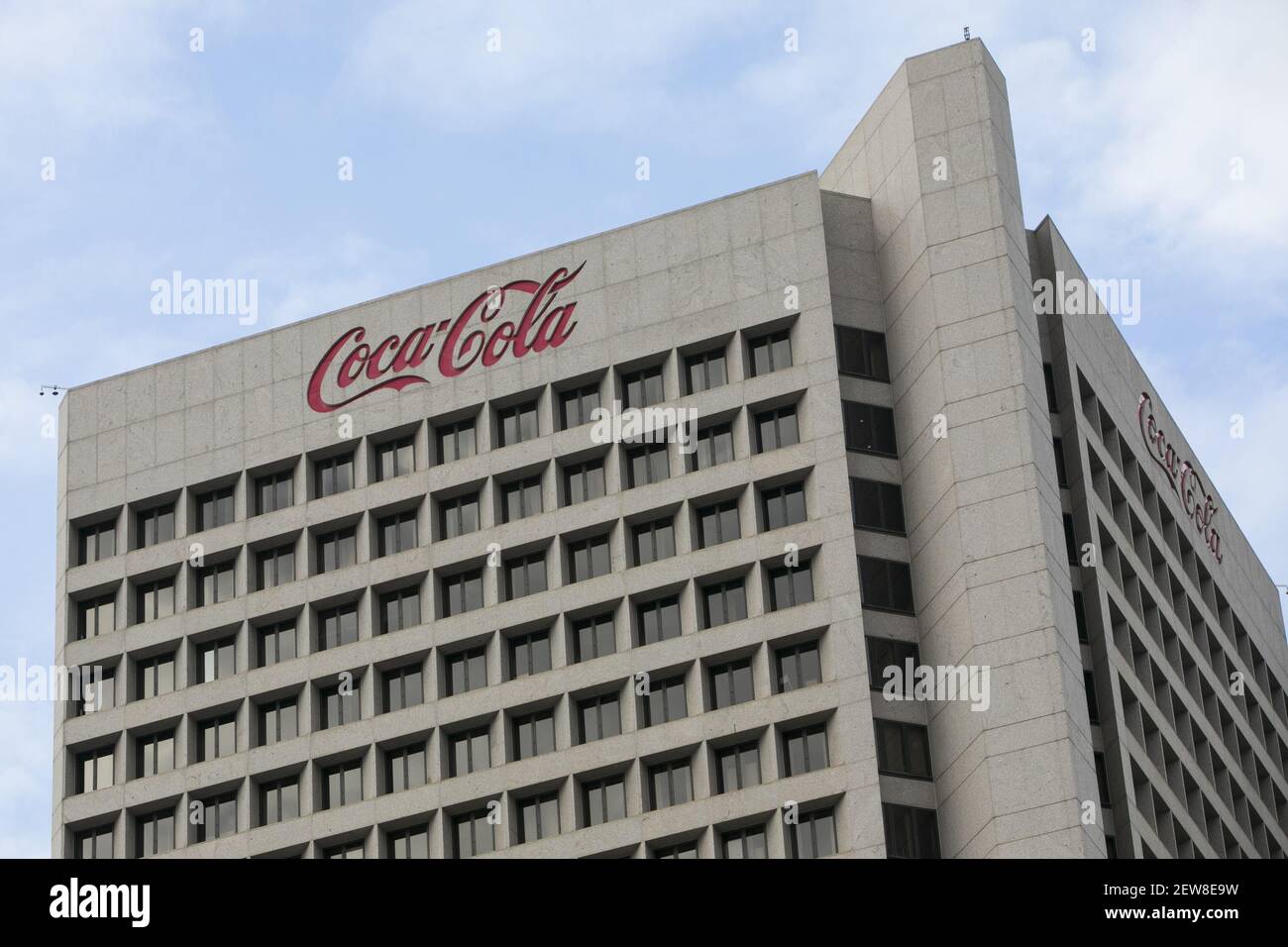 A logo sign outside of the headquarters of The Coca-Cola Company in ...