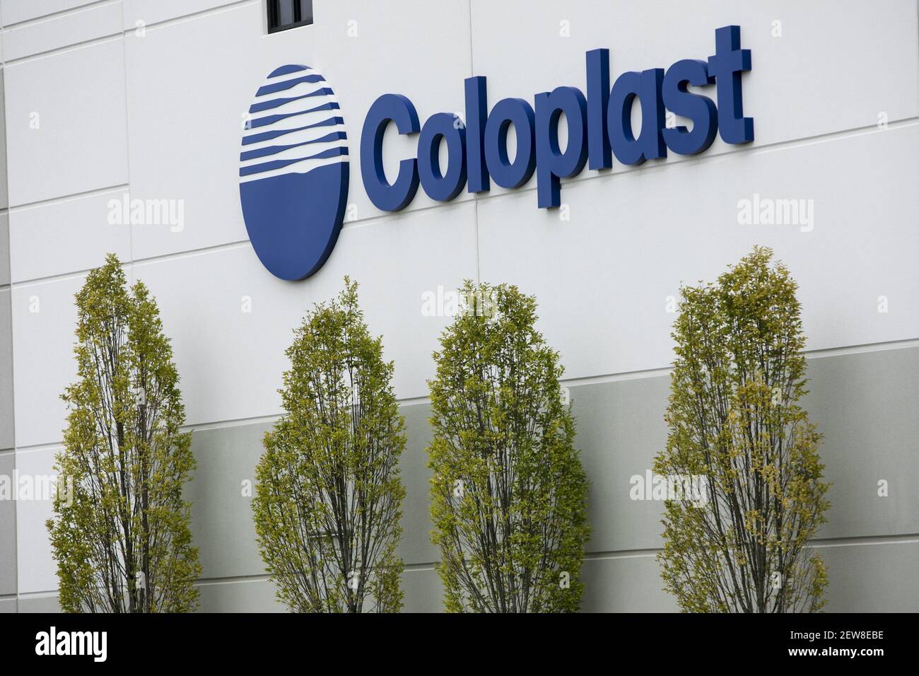 A logo sign outside of a facility occupied by Coloplast in Lithia ...
