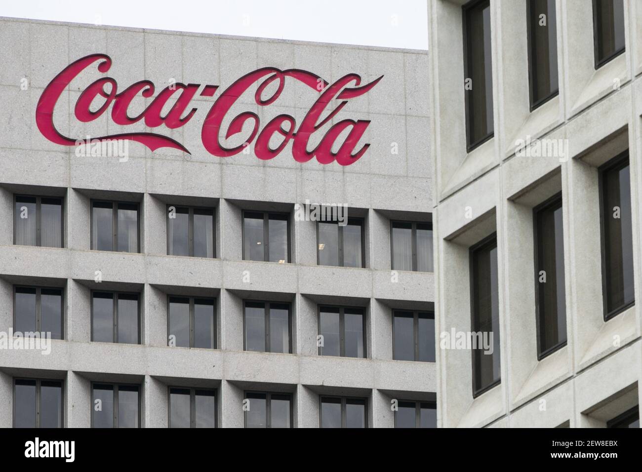 A logo sign outside of the headquarters of The Coca-Cola Company in ...