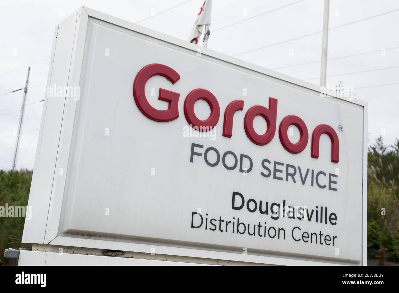 A logo sign outside of a facility occupied by Gordon Food Service in ...
