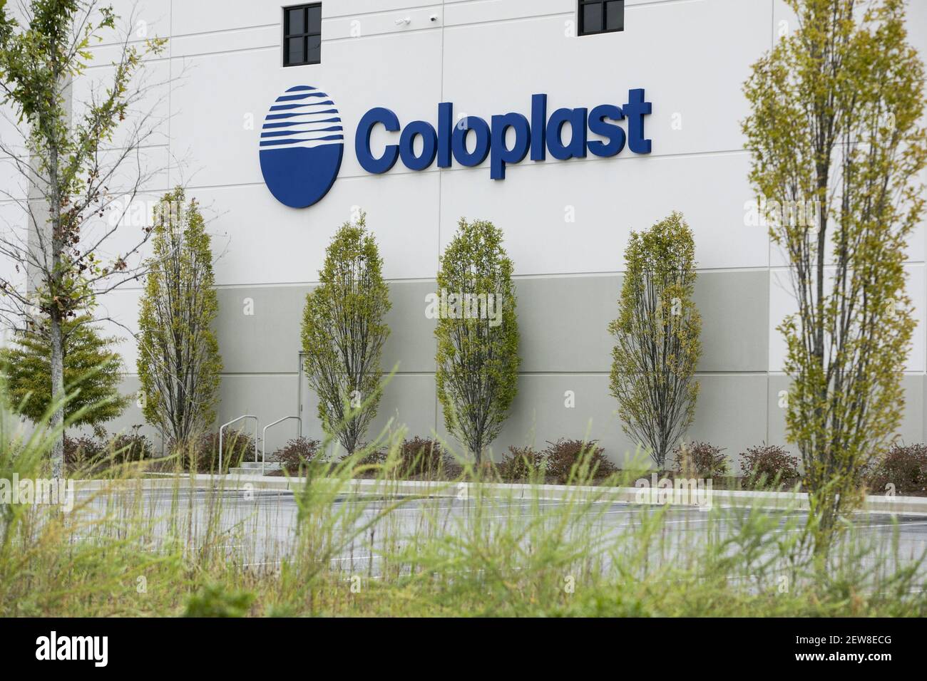 A logo sign outside of a facility occupied by Coloplast in Lithia ...