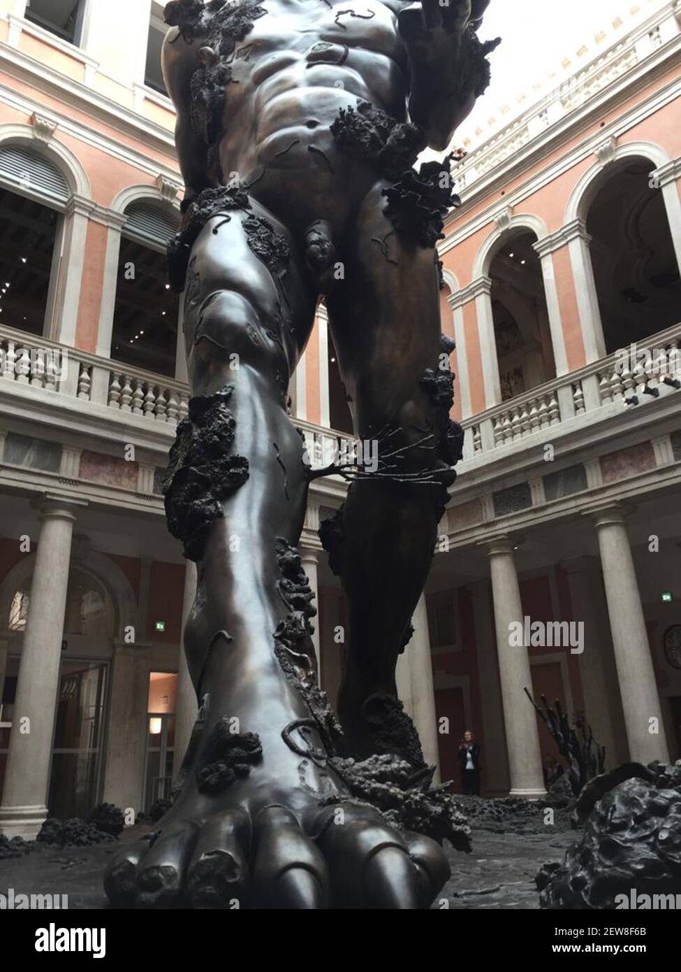 Damien Hirst's monumental "Demon with Bowl" fills the three-story ...