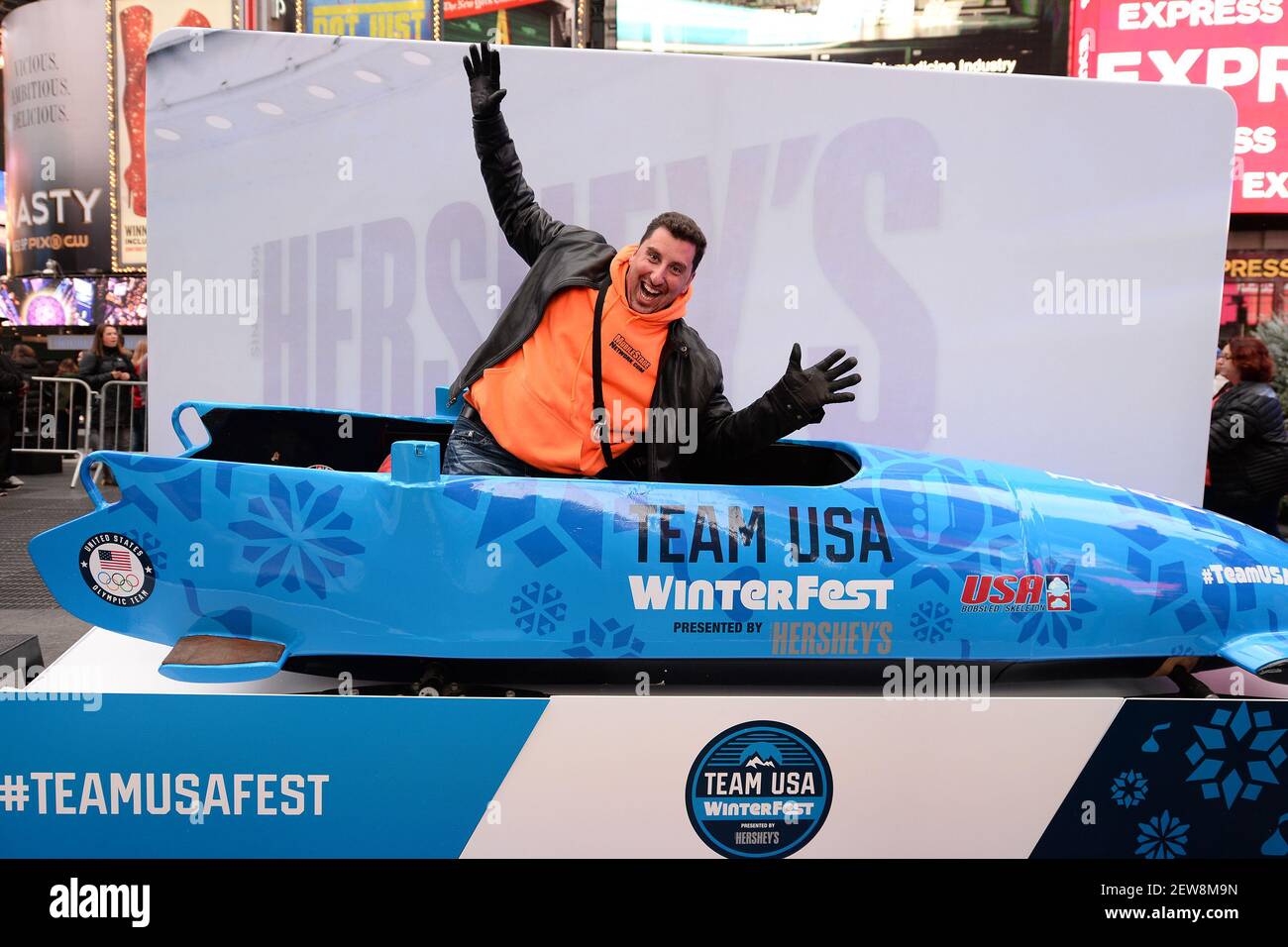 Alexander Mazzei climbs into an olympic bobsled during the Team USA ...