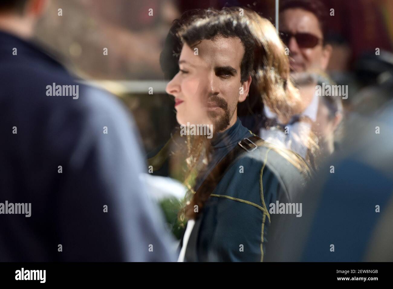 Reflection of onlookers are seen as Lauren Nash, from Philladelphia ...