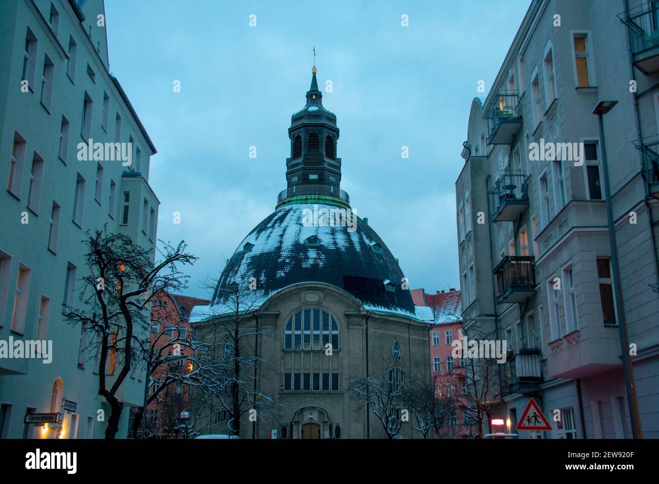 Snowy church and tree during a blizzard in Berlin Germany Stock Photo ...