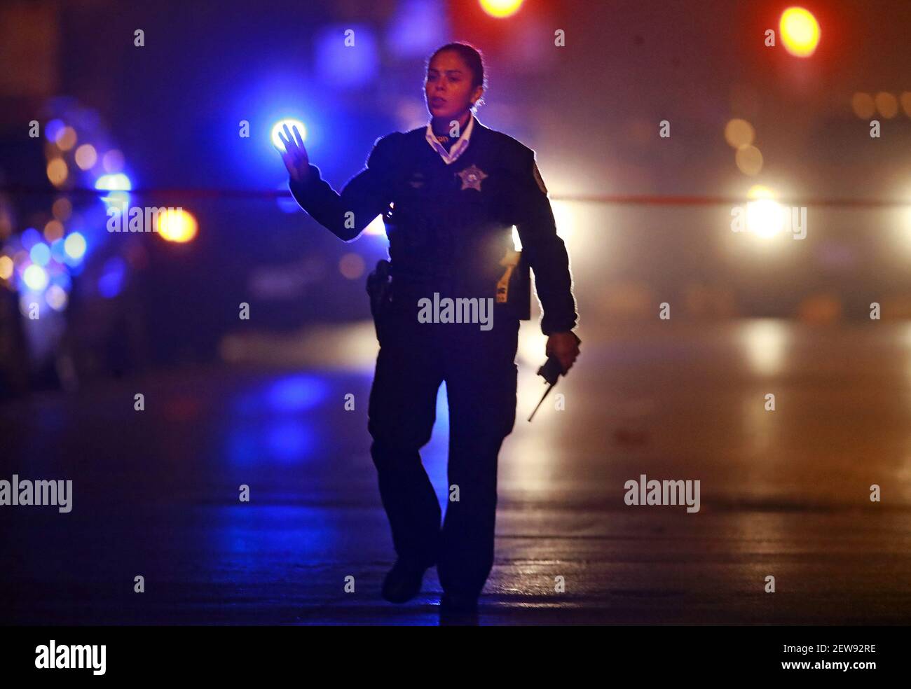 A member of the Chicago Police Department, at the scene of a shooting ...