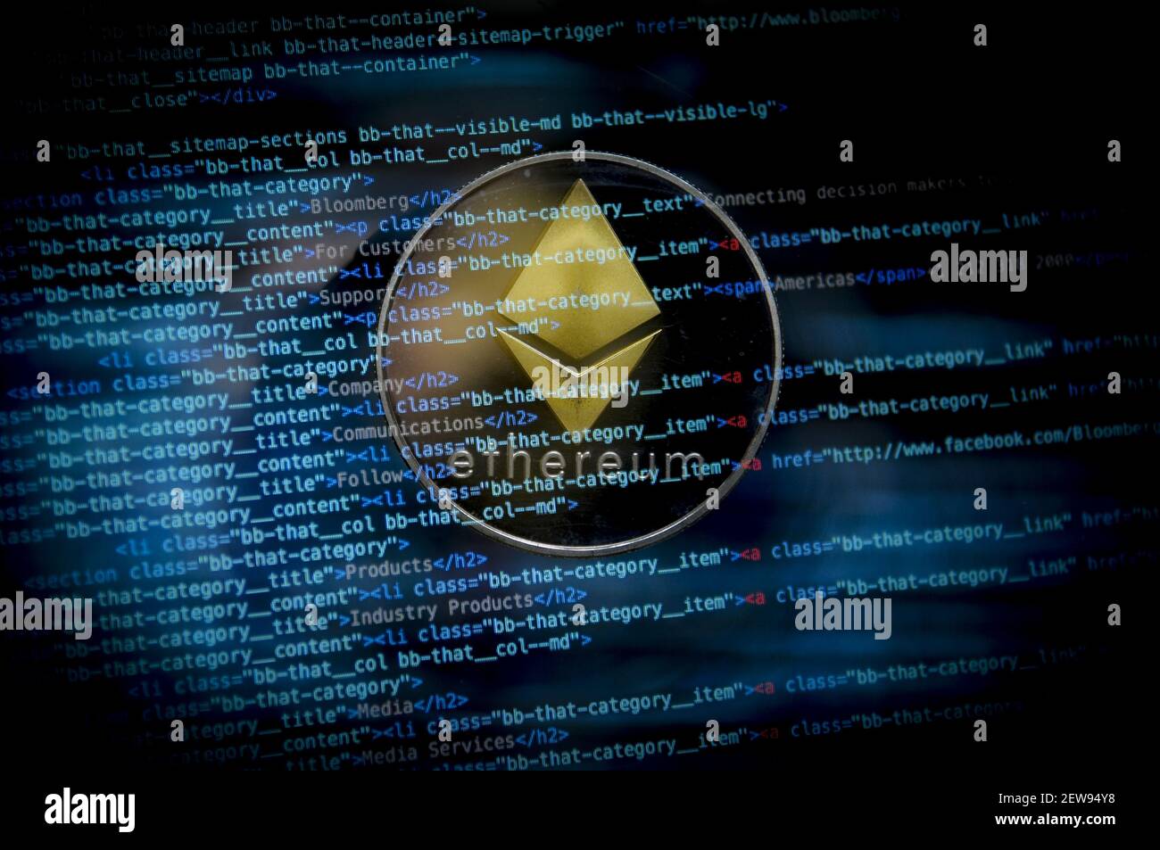 A replica "ether" cryptocurrency coin in seen in this photo ...