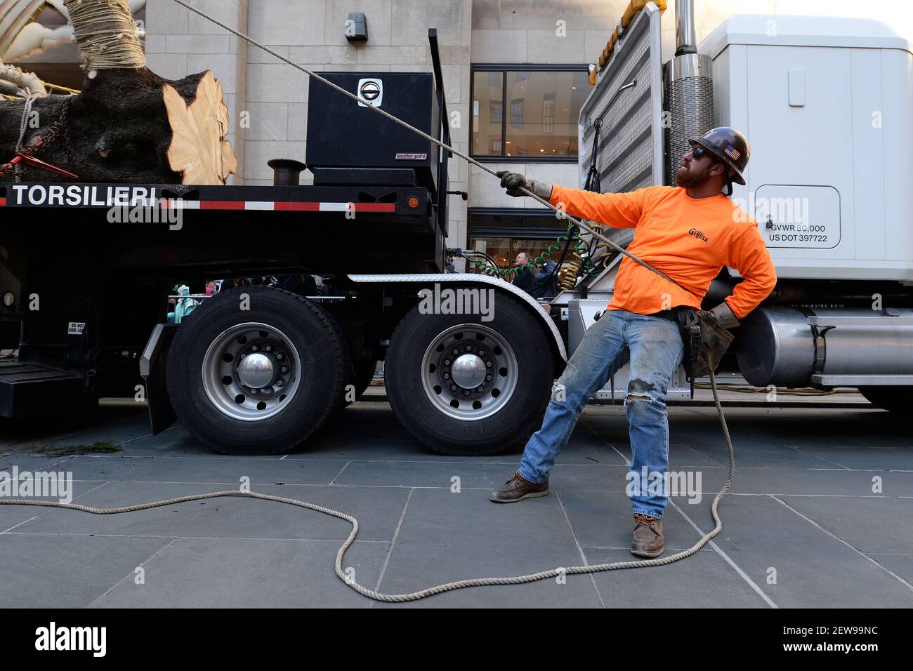 Iron worker Mark Sabbagh holds a rope during the installation of the 75 ...