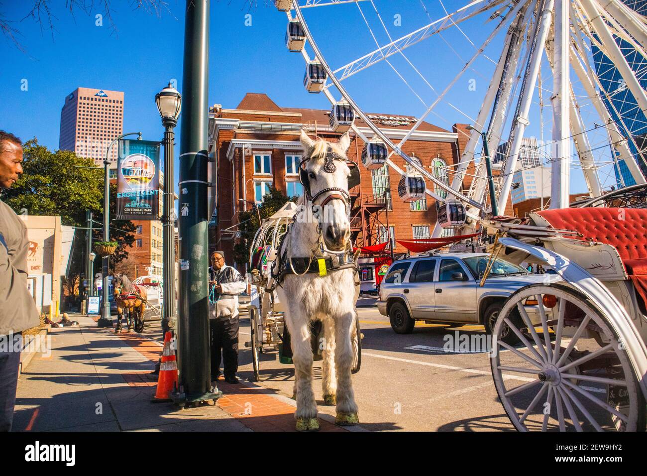 Atlanta, Ga USA - 03 07 20: Carriage horse and man close up downtown ...