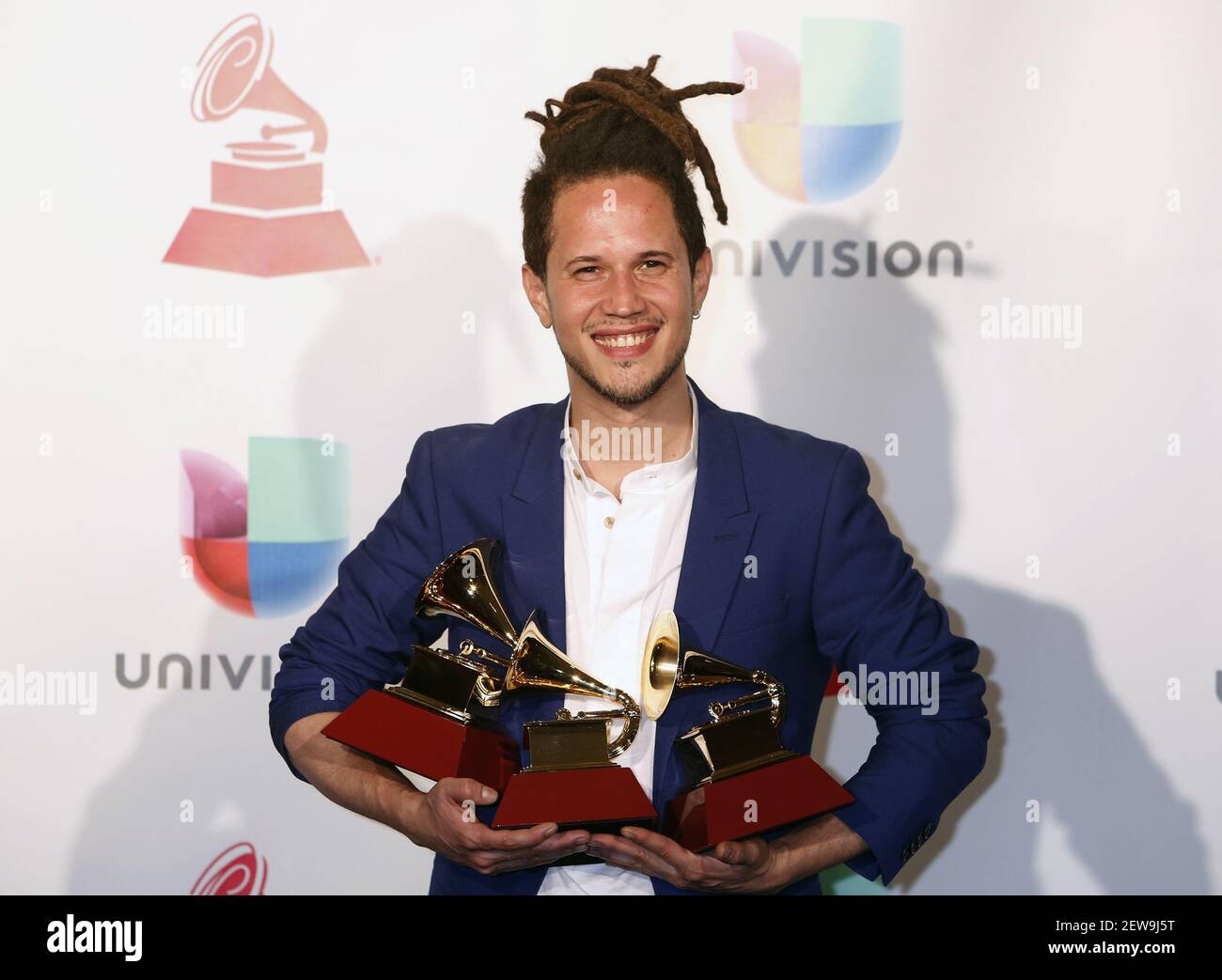Vicente Garcia poses with his award for best new artist at the 18th ...