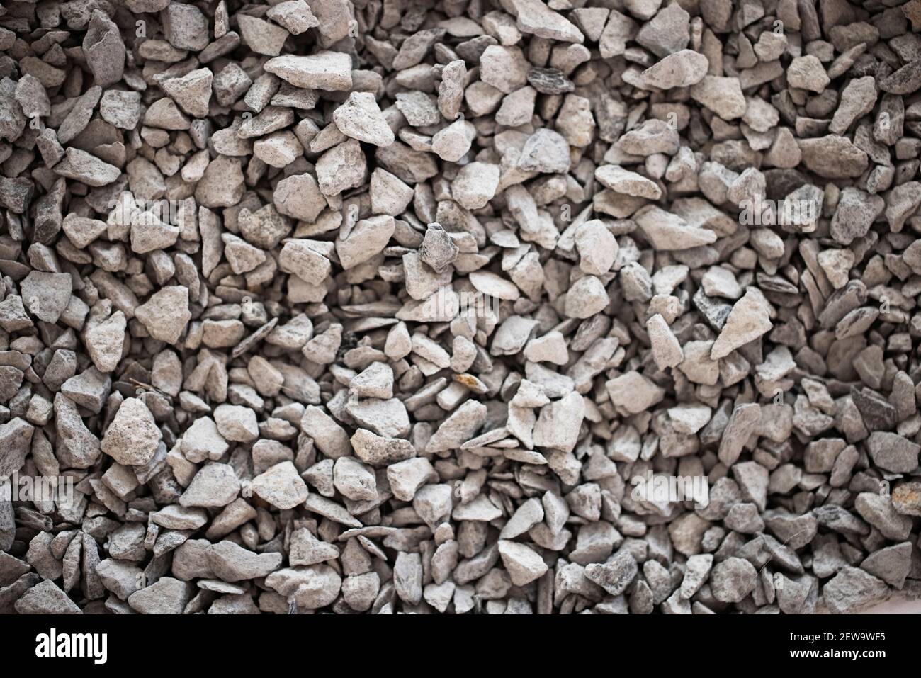 Small grey rough stone background Stock Photo - Alamy