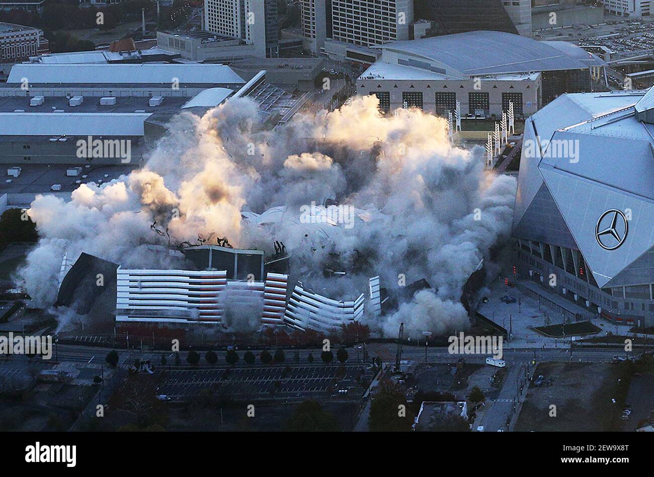 The Georgia Dome comes crumbling down in a ball of dust on Monday, Nov ...