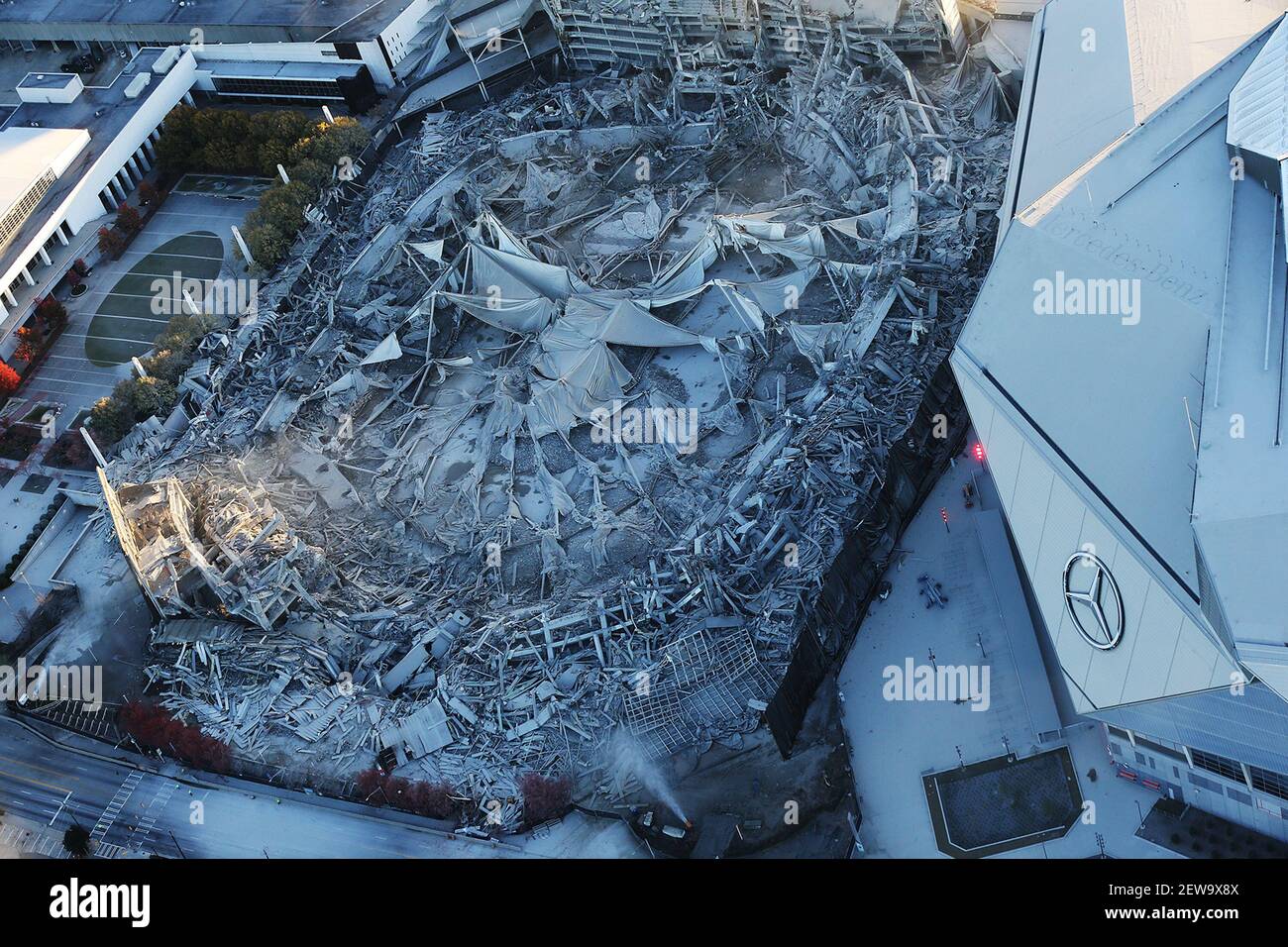 The remains of the Georgia Dome after it was imploded next to Mercedes ...