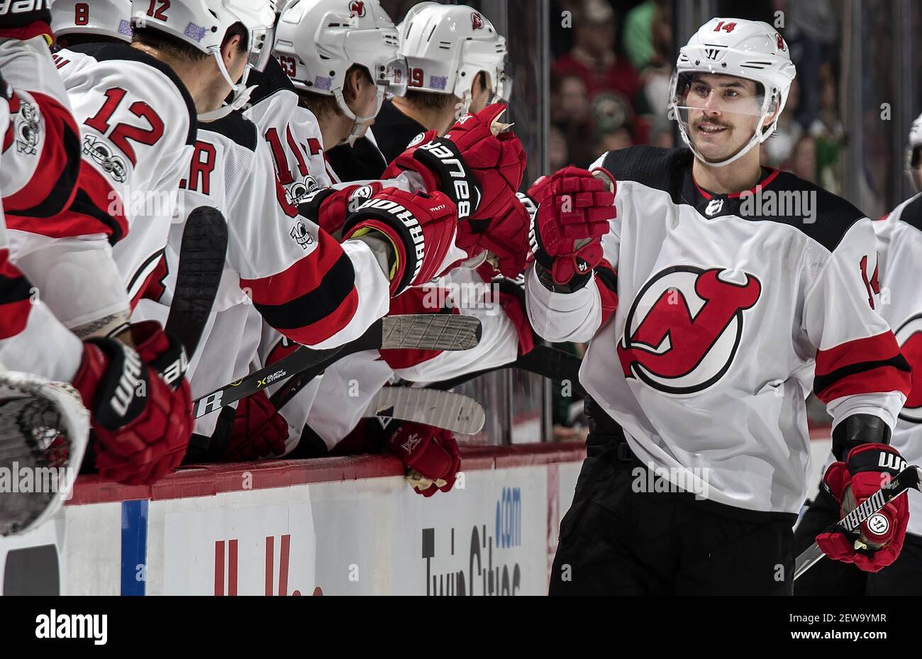 The New Jersey Devils' Adam Henrique (14) celebrates with teammates ...