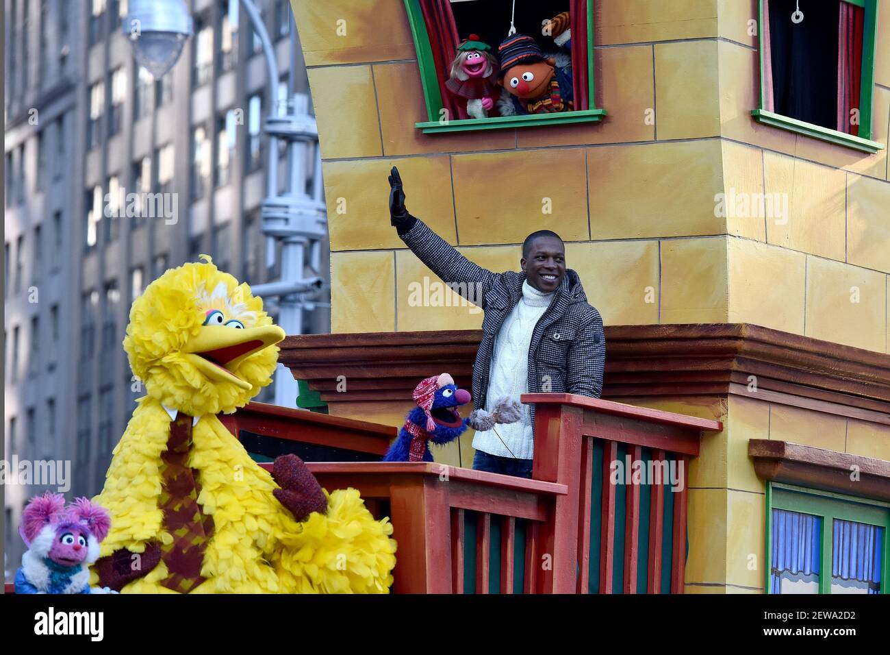 Singer Leslie Odom Jr. rides atop the Sesame Street float during the ...