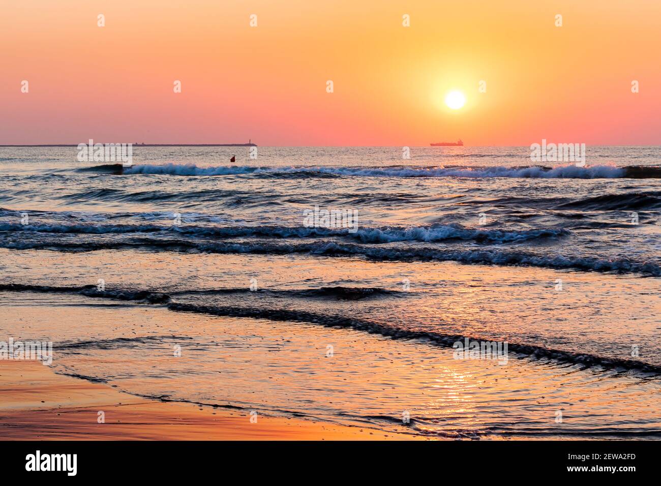 A mesmerizing view of the amazing sunset over the sea captured from the ...