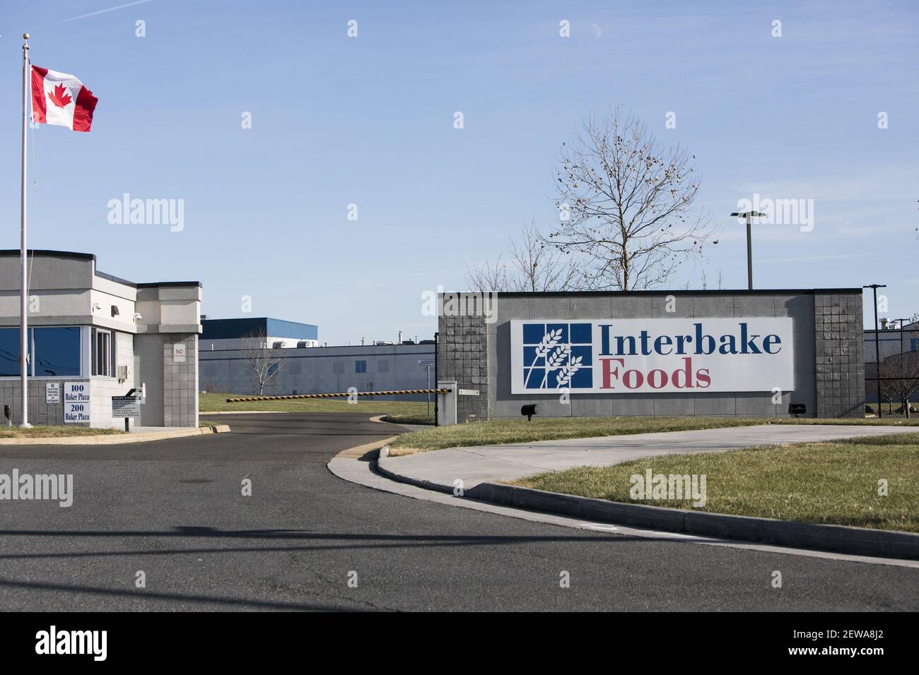 A logo sign outside of a facility occupied by Interbake Foods in Front ...