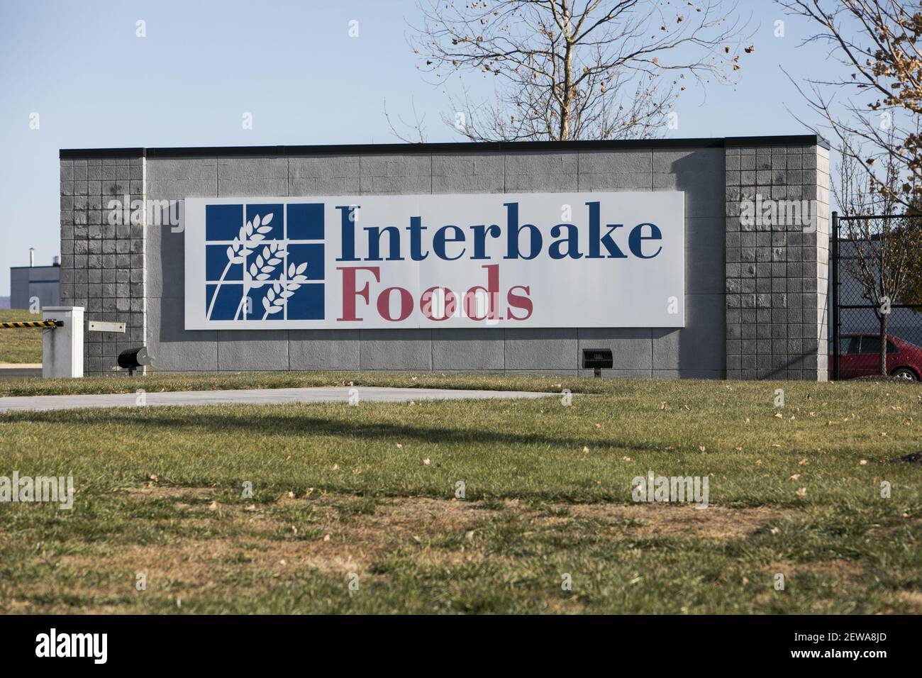 A logo sign outside of a facility occupied by Interbake Foods in Front ...