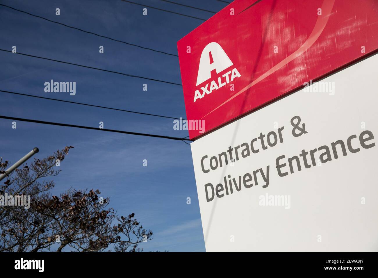 A logo sign outside of a facility occupied by Axalta Coating Systems in ...