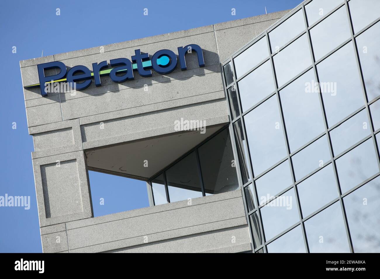 A logo sign outside of a facility occupied by Peraton in Herndon ...