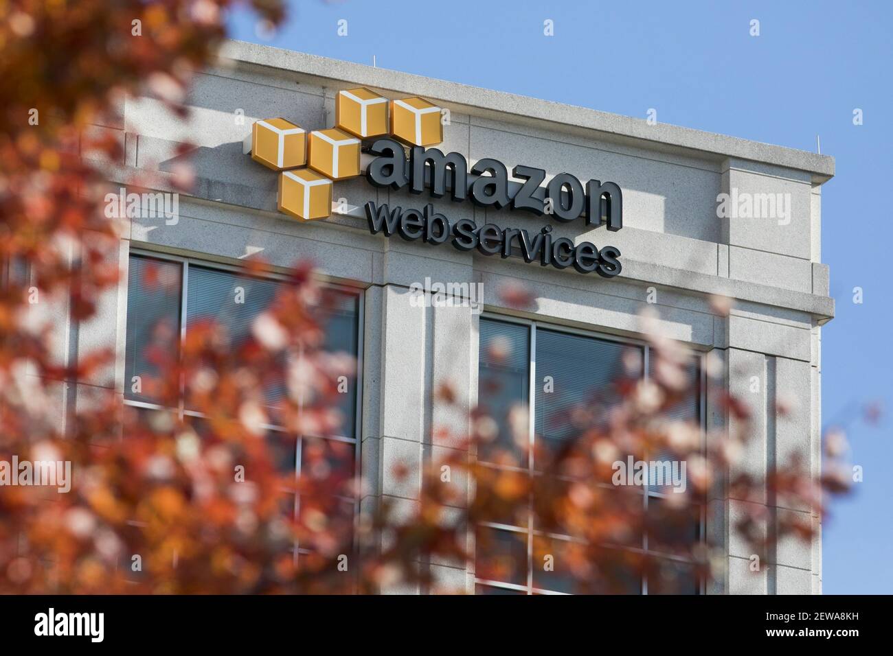 A logo sign outside of a facility occupied by Amazon Web Services (AWS ...