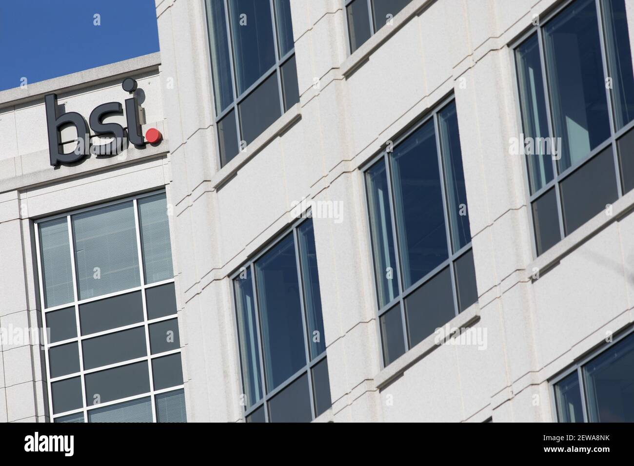A logo sign outside of a facility occupied by the BSI Group in Herndon ...