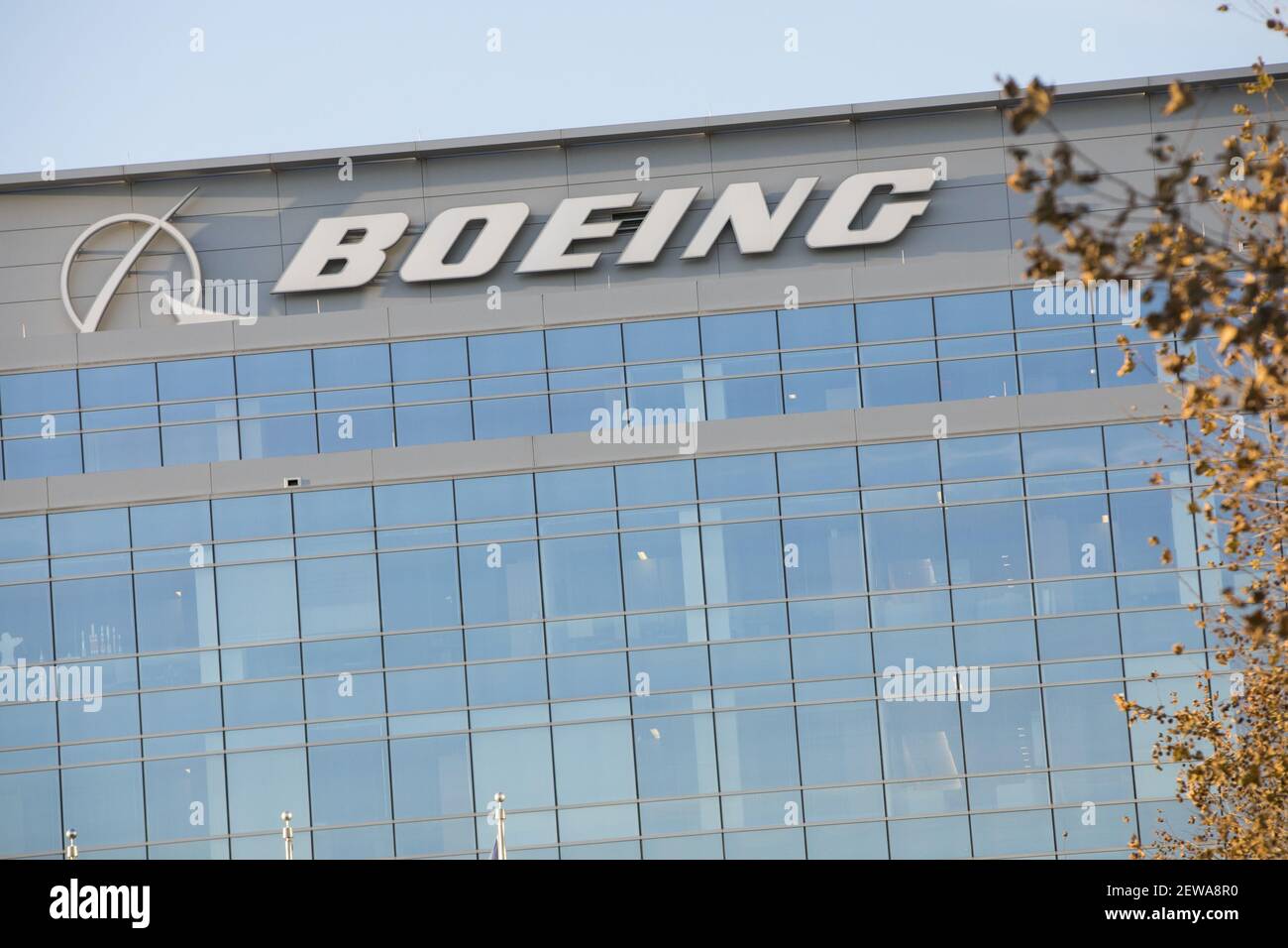 A logo sign outside of a facility occupied by The Boeing Company in ...
