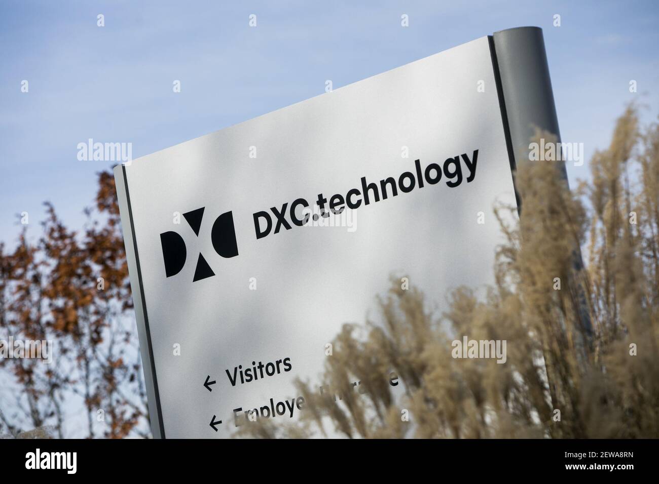 A logo sign outside of a facility occupied by DXC Technology in ...