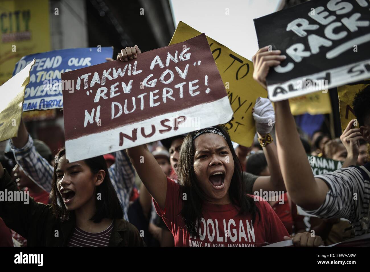 Protesters chant slogans as they take part in a demonstration against ...