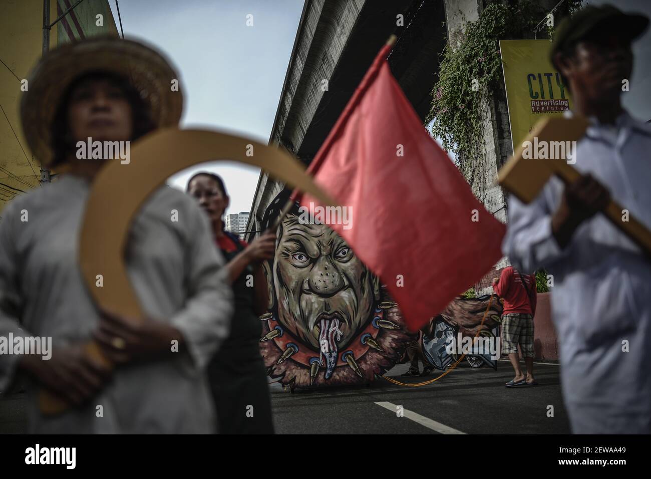 Protesters pull an effigy of Philippine President Rodrigo Duterte and ...