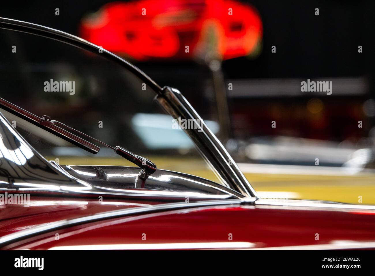 Red classic car windshield in a gallery museum Stock Photo - Alamy
