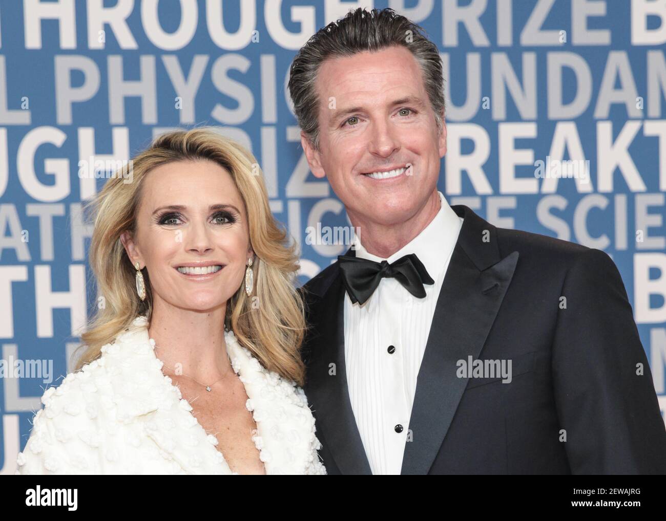California State Lt. Gov. Gavin Newsom (R) and wife Jennifer Siebel ...