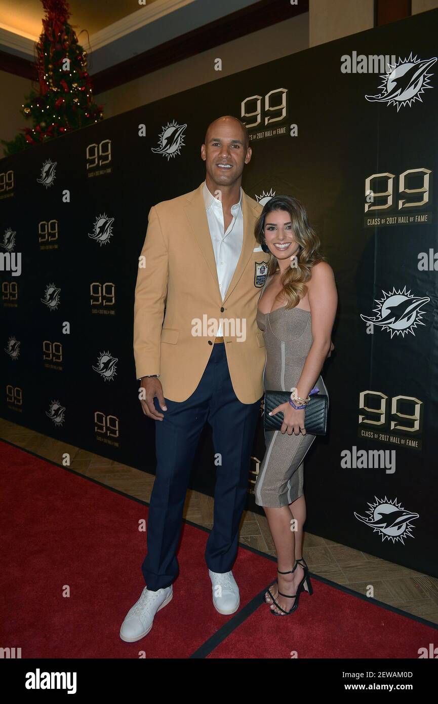 Jason Taylor and girlfriend Monica Velasco attend The Miami Dolphins ...