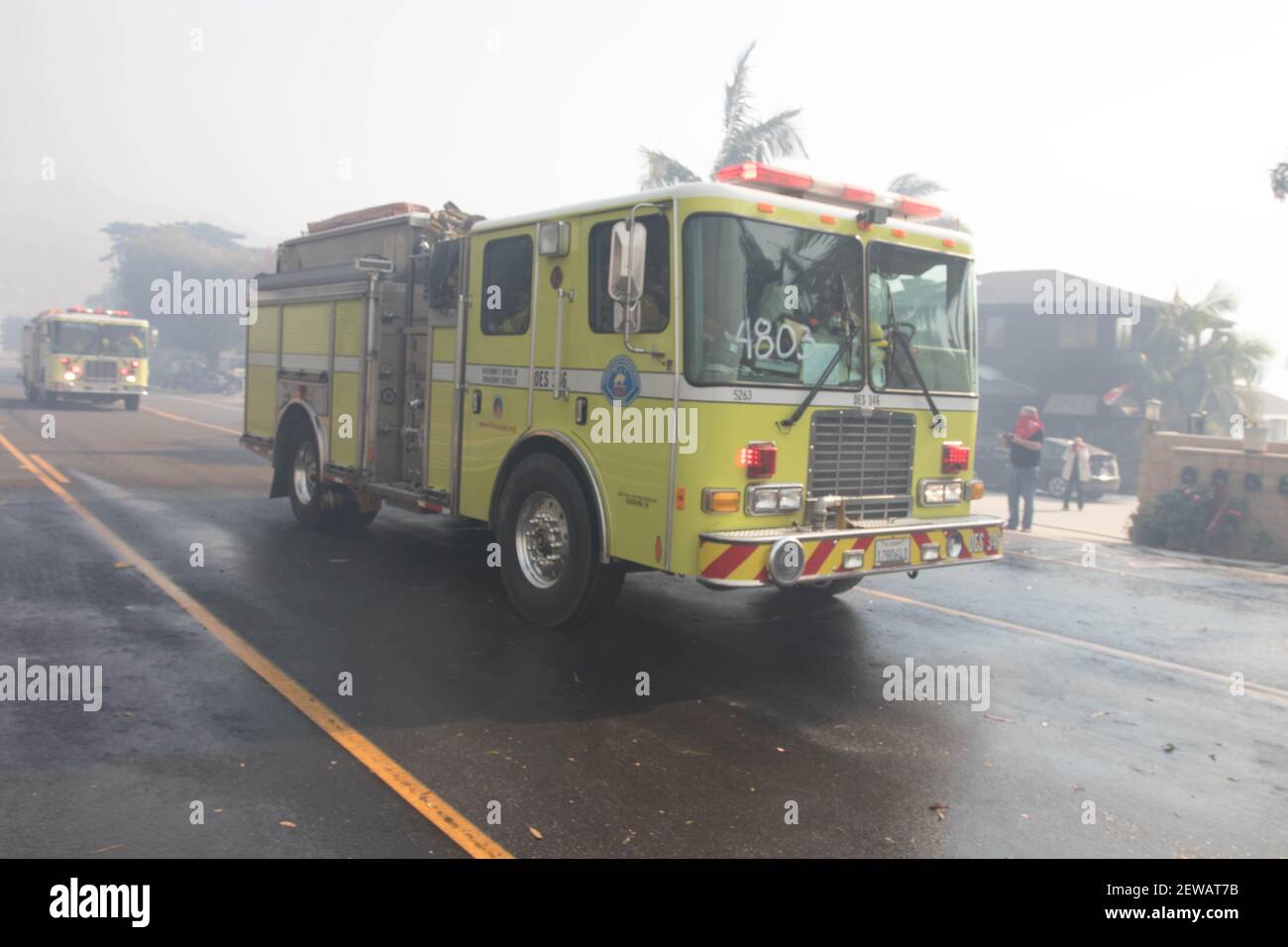 Firefighters tries to extinguish the Thomas Fire as it burns near ...