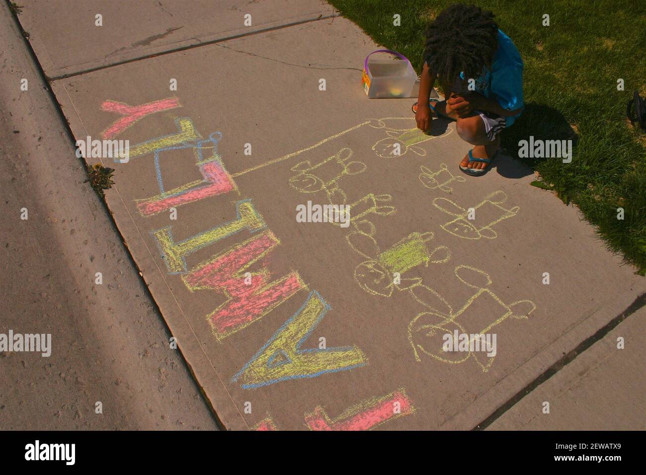 Kids sidewalkchalk drawing Stock Photo - Alamy