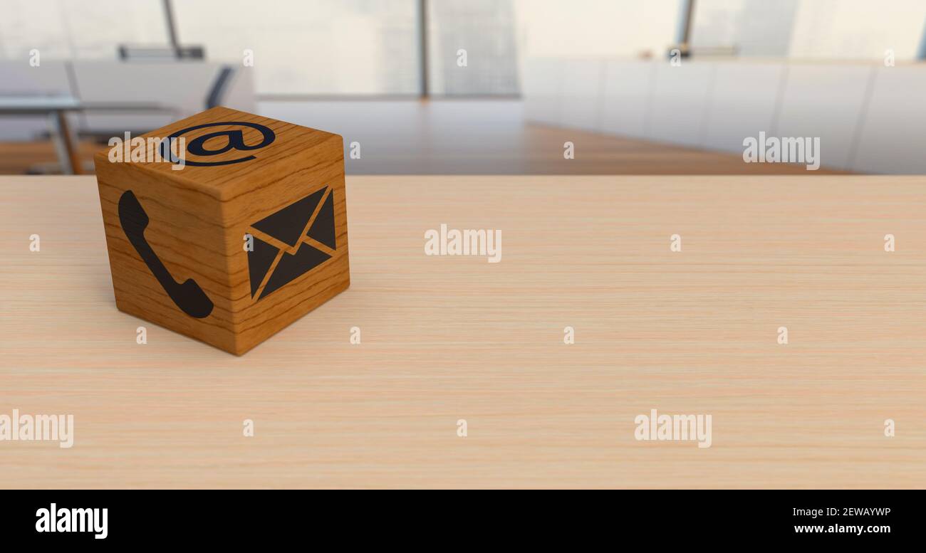 Wooden dice on office desk with three different contact symbols and ...