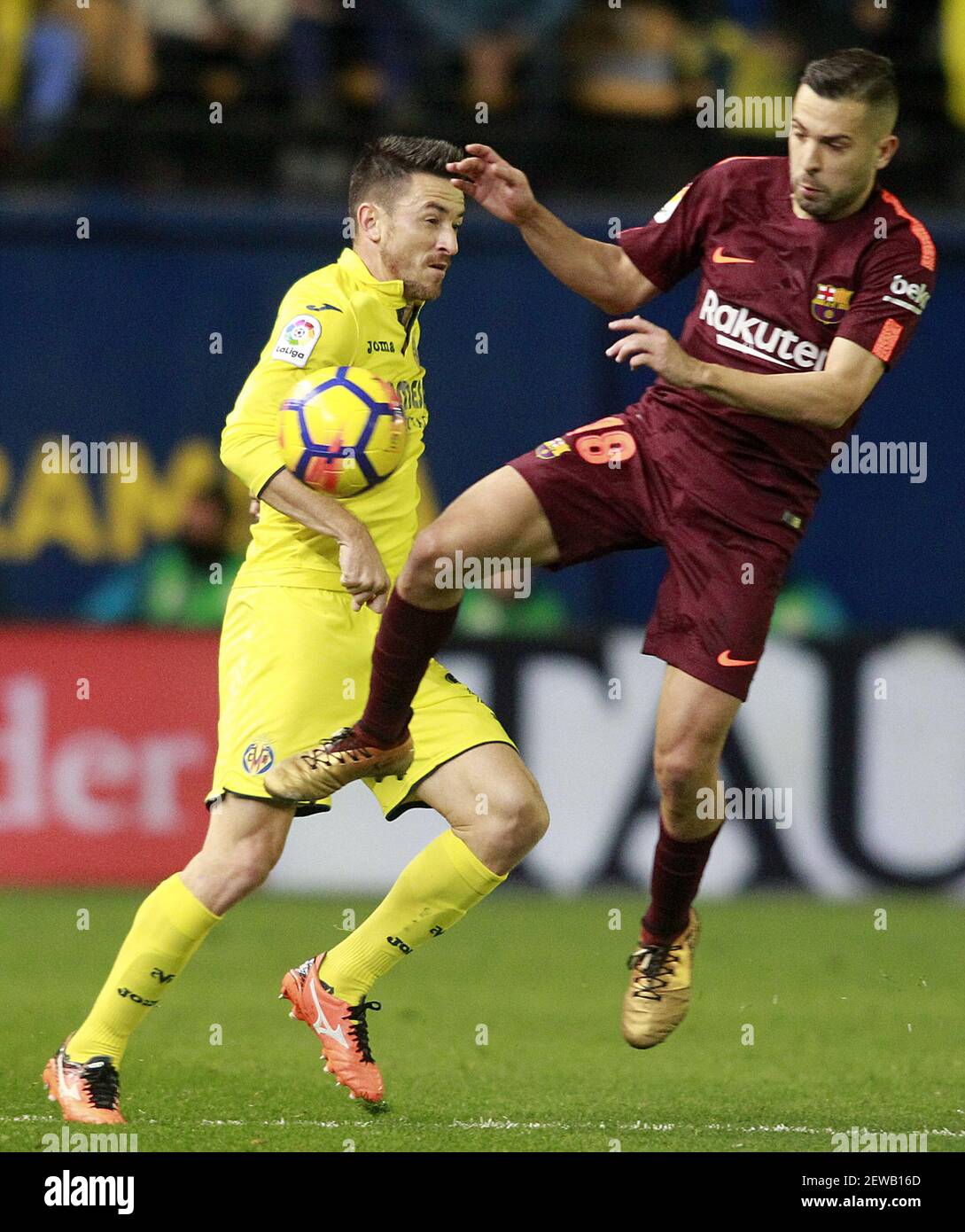 Villarreal CF's Antonio Rukavina (l) and FC Barcelona's Jordi Alba ...