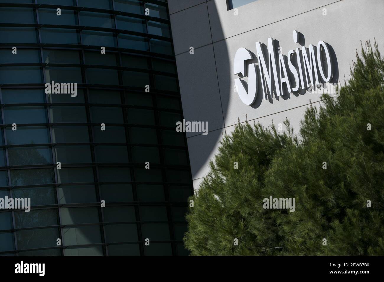 A logo sign outside of the headquarters of Masimo in Irvine, California ...