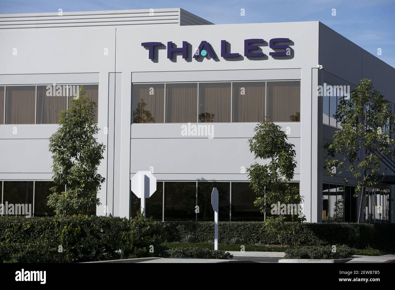 A logo sign outside of a facility occupied by the Thales Group in ...