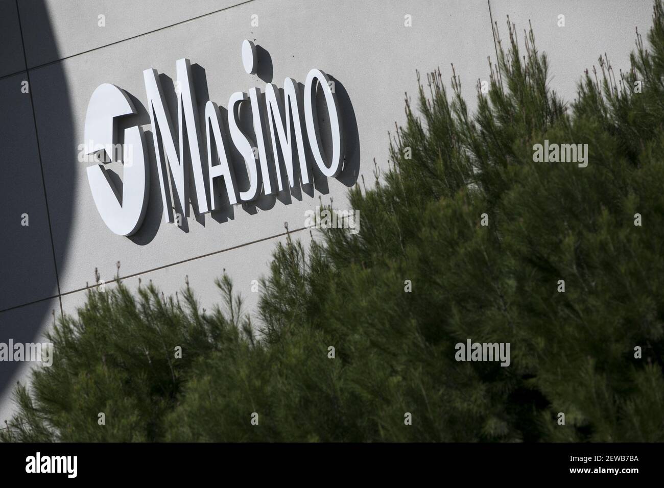 A logo sign outside of the headquarters of Masimo in Irvine, California ...